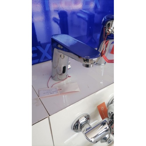 Laser washbasin mixer with sensor